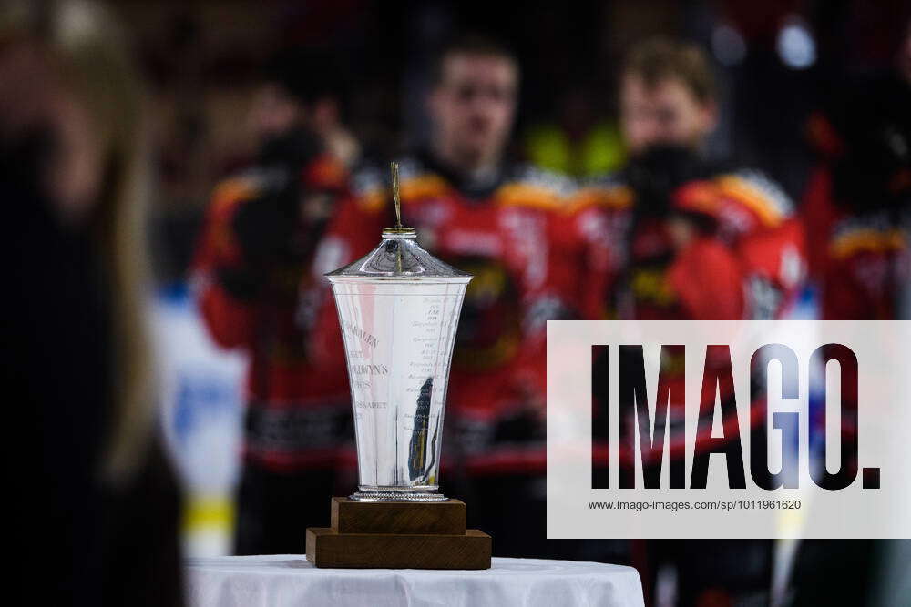 220512 LeMat trophy with Lulea players depressing in the background ...