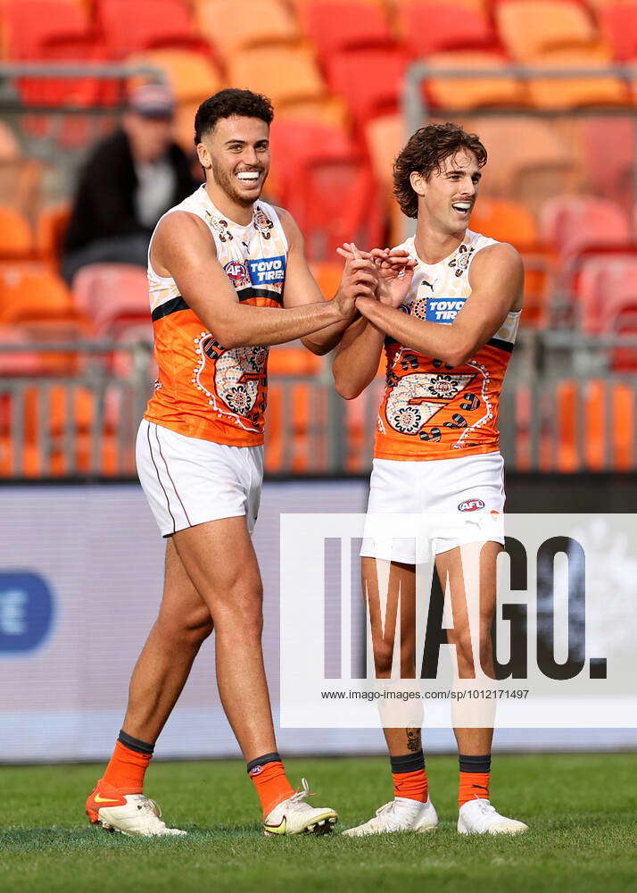 AFL GIANTS EAGLES, Jake Riccardi of the Giants celebrates kicking a ...