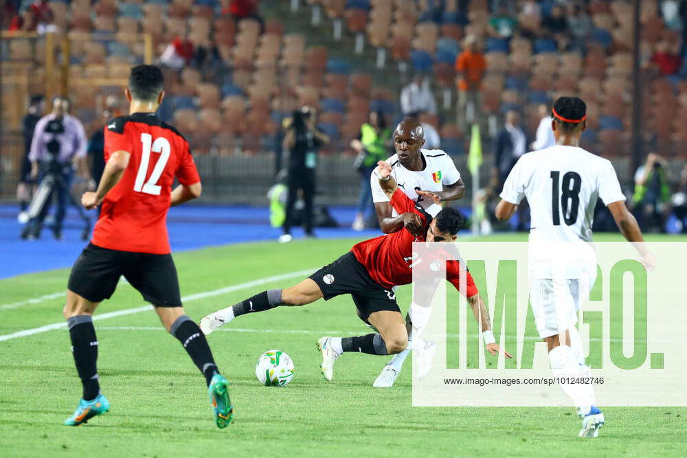 CAIRO, Egypt s Ahmed Sayed vies with Guinea s Antoine Conte during ...