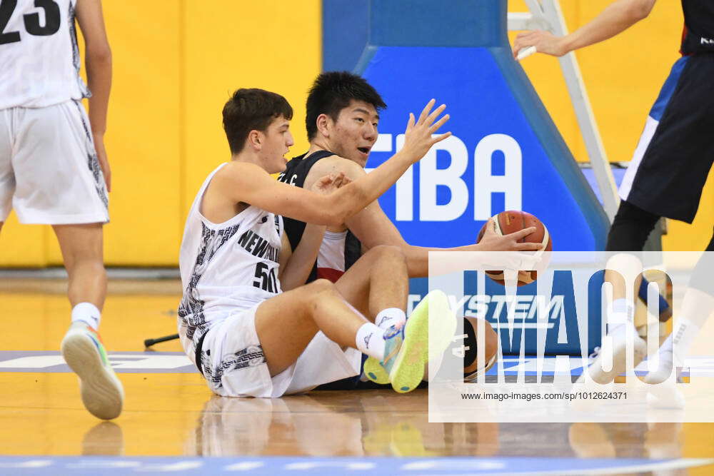 June 14, 2022, Doha, Ar Rayyan, Qatar: Dante Malakatea (L) of New Zealand Basketball team and