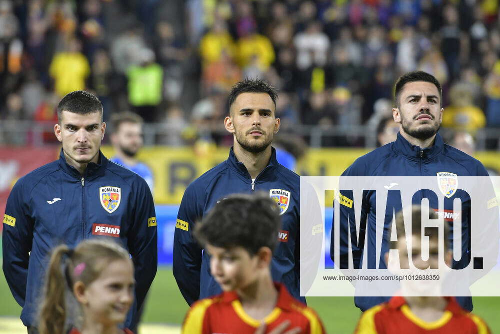 Valentin Mihaila, Marius Marin and Andrei Burca at the football match between Romania and