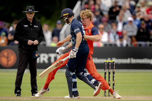 AMSTELVEEN Tim Pringle of the Netherlands in action against Phil Salt ...