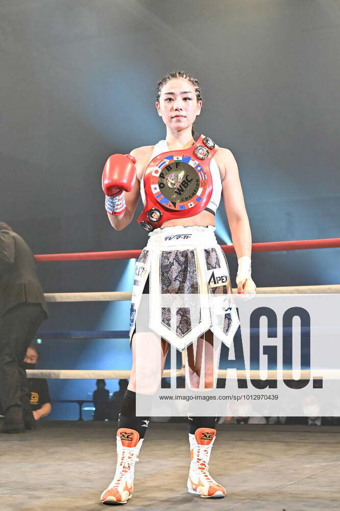 Mizuki Chimoto poses with the championship belt after winning the OPBF ...