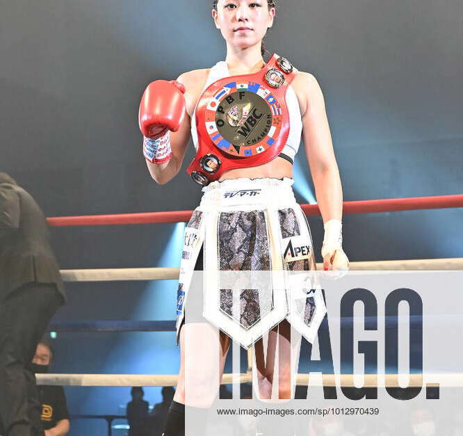 Mizuki Chimoto poses with the championship belt after winning the OPBF ...