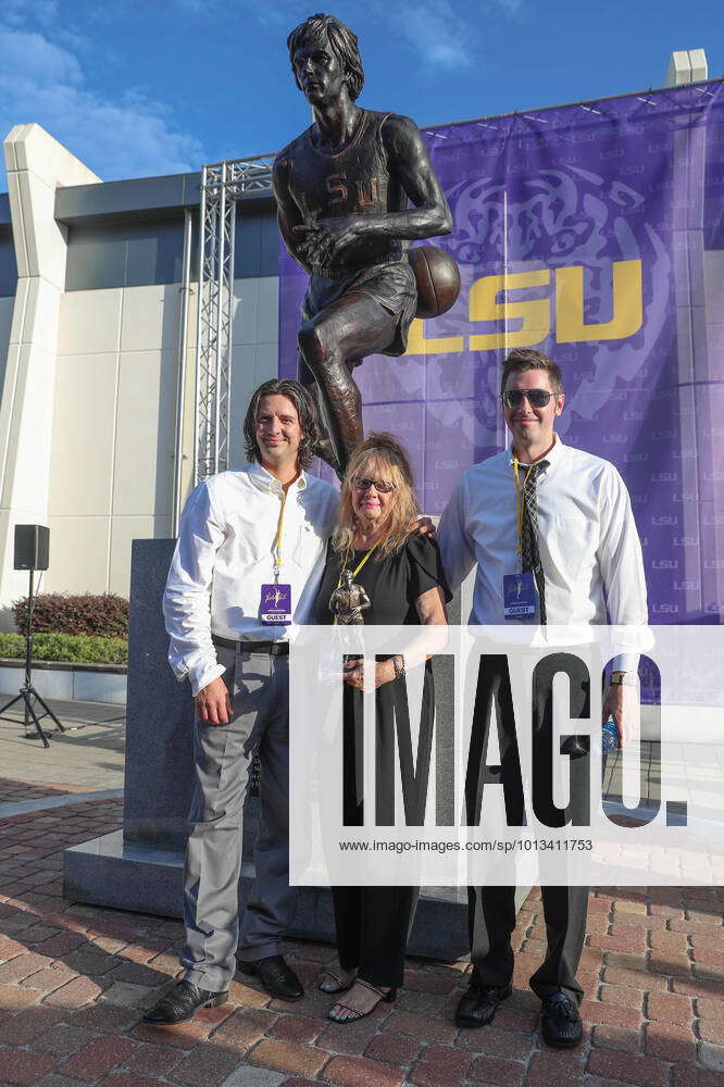 July 25, 2022: Jackie Maravich poses with a small statue with her son s ...