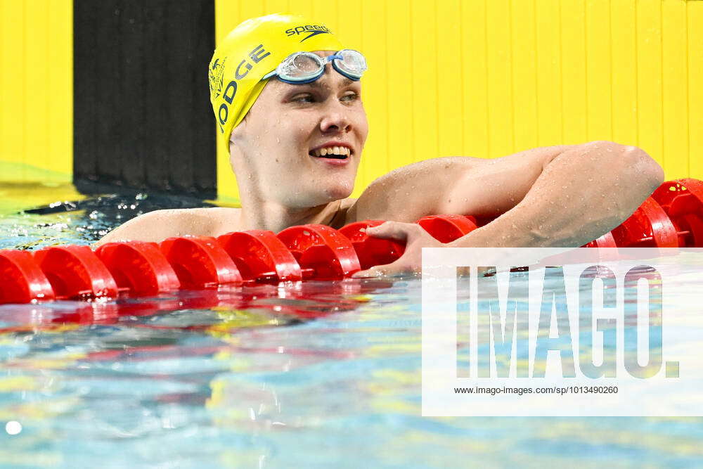 COM22 SWIMMING FINALS, Timothy Hodge of Australia reacts after winning ...