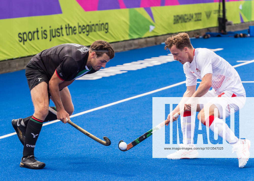 Hockey Day Three James Albery of England and James Carson of Wales vy ...