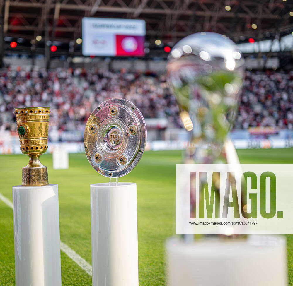 The cup of the Supercup on a pedestal next to the other German Cup DFB ...