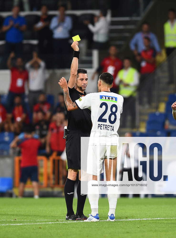 Referee Ali Palabiyik show yellow card to Raoul Petretta of Kasimpasa ...