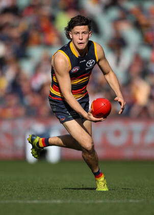AFL CROWS KANGAROOS, Jake Soligo of the Crows celebrates victory with ...