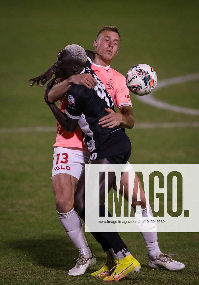 SOCCER ADELAIDE CITY UNITED, Ayom Ayom of Adelaide City clashes with ...