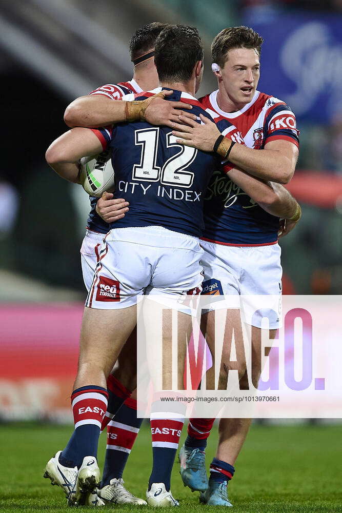 NRL ROOSTERS TIGERS, Nat Butcher of the Roosters celebrates scoring a ...