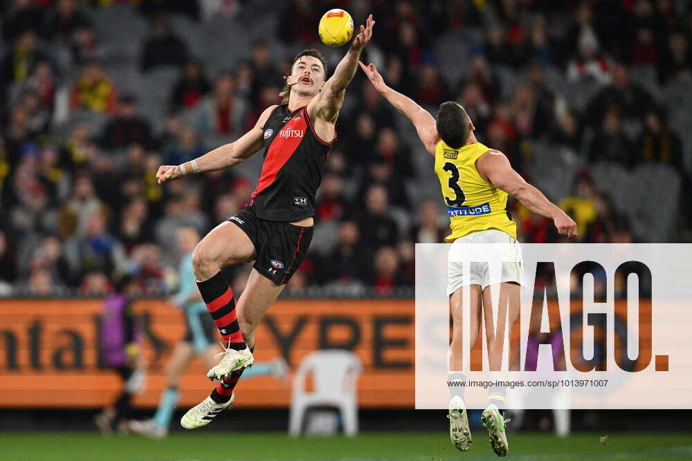 AFL BOMBERS TIGERS, Sam Draper of Essendon Bombers (left) in action ...