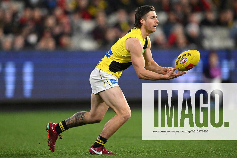 AFL BOMBERS TIGERS, Liam Baker of Richmond in action during the AFL ...