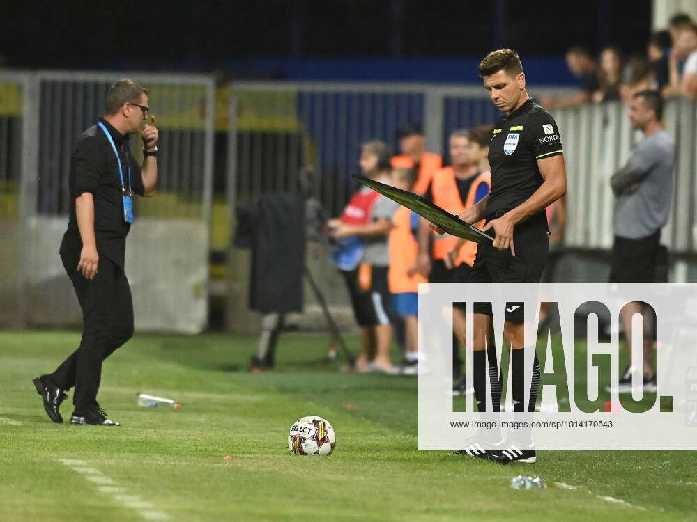 Reserve referee Marian Barbu reacts in the football match between ...