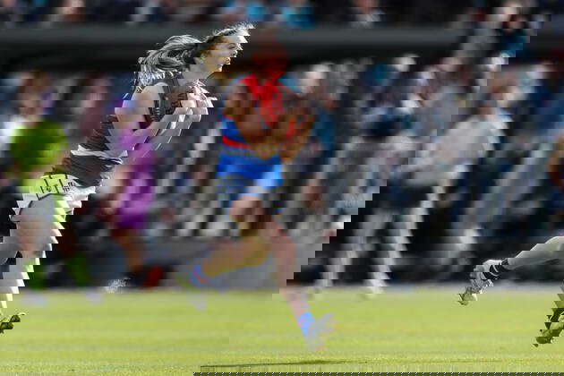 AFLW POWER BULLDOGS, Sarah Hartwig of the Bulldogs chased by Maggie ...