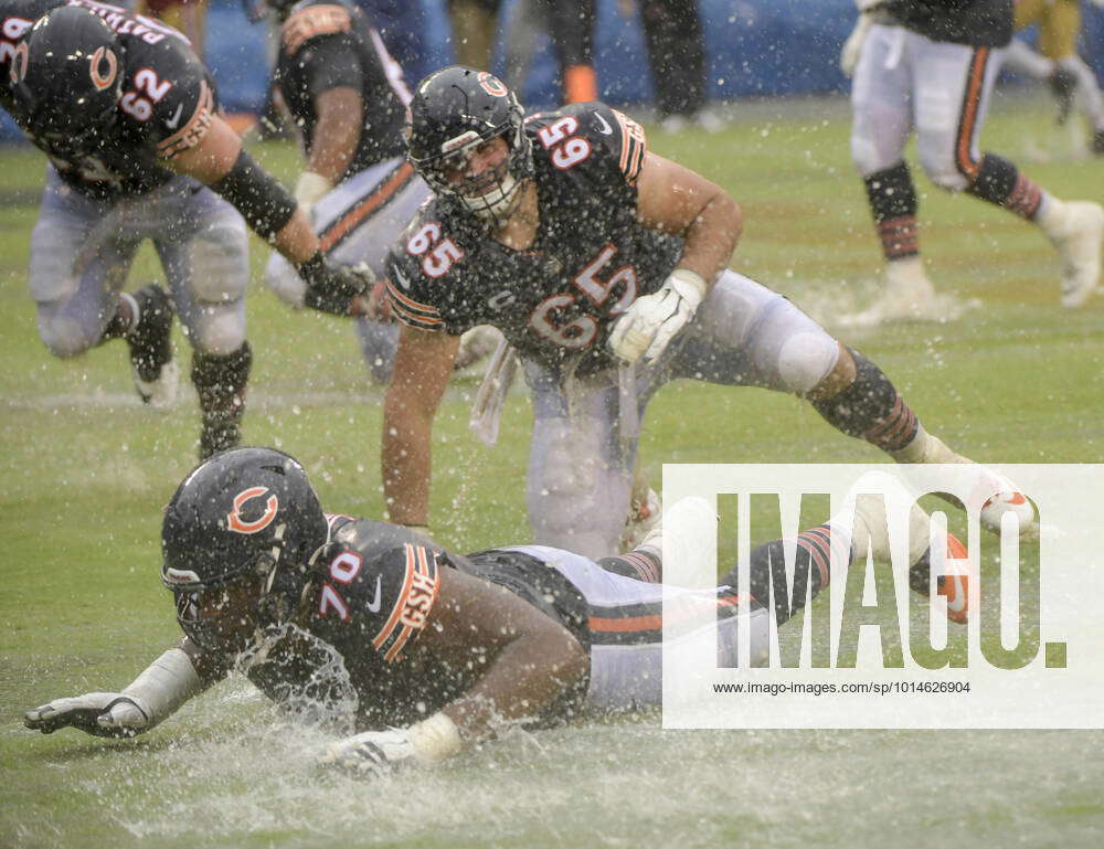 Chicago Bears Braxton Jones (70) dives into the flooded end zone after ...