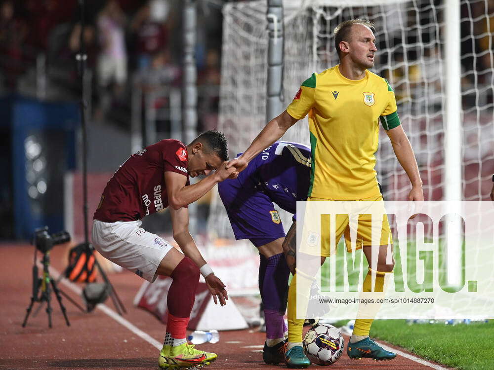 Alin Iustin Popescu and Manuel Adrian Scarlatache help Valentin Ionut ...
