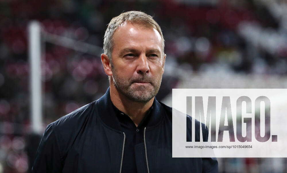 Coach Hansi Flick tense pinched facial expression action upper body ...