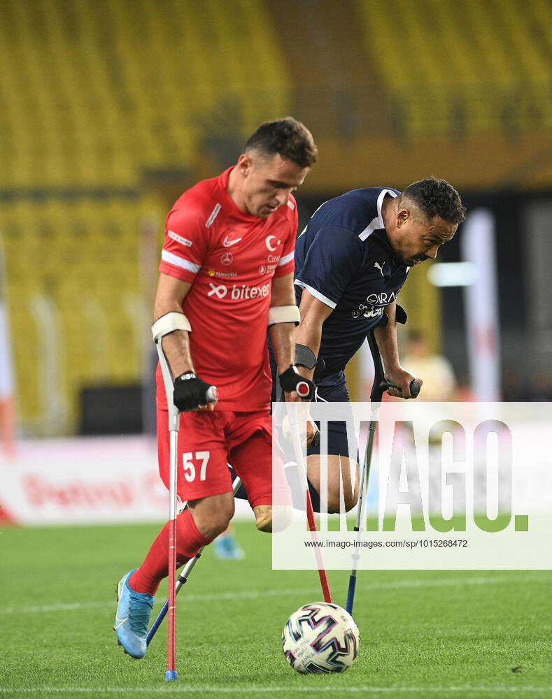 Ismail Korkmaz 57 of Turkey and Nabil Labhill (R) of France during the ...