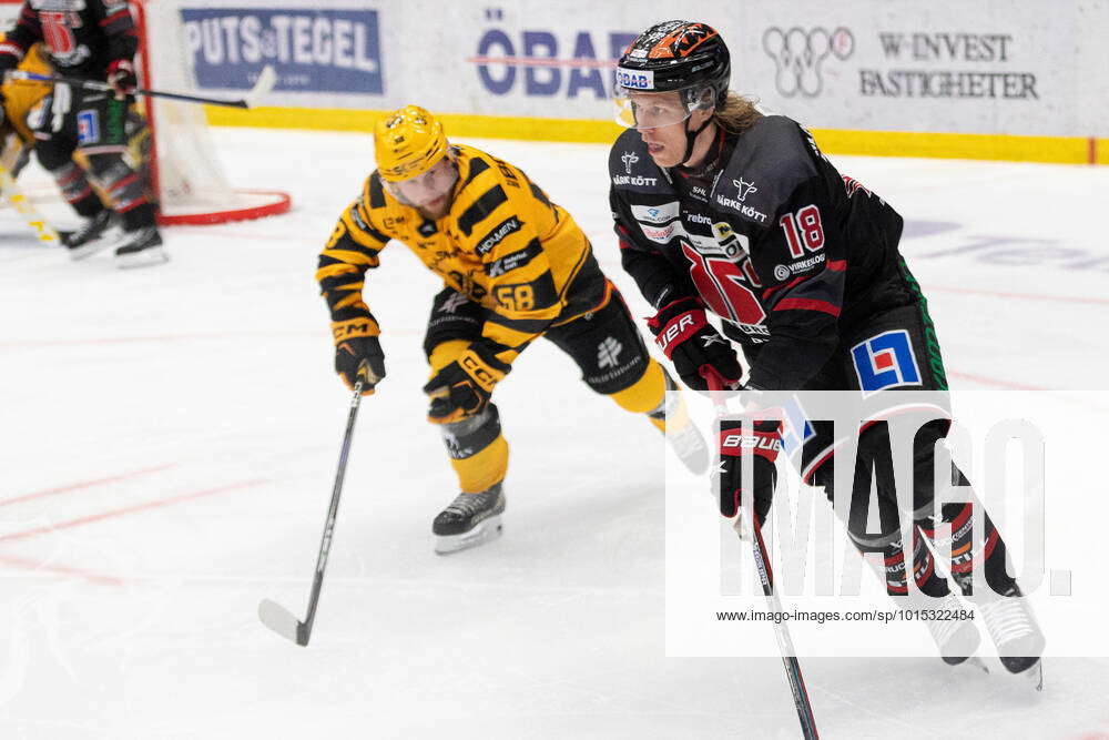 221001 Skellefteas Oskar Nilsson and Örebros Rodrigo Abols during the ice hockey match in the SHL