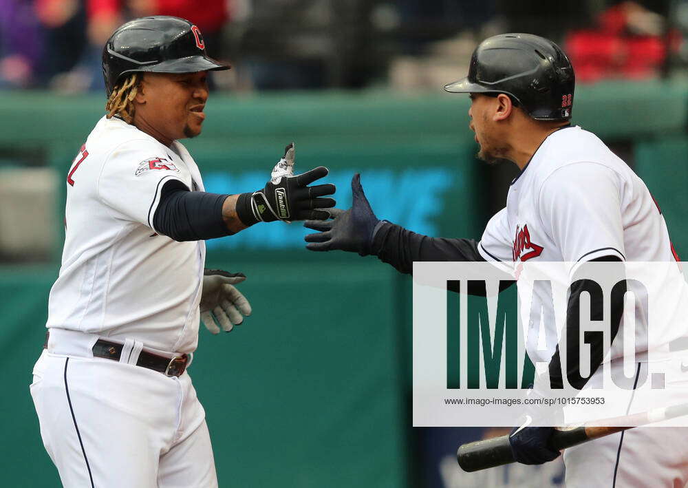 Cleveland Guardians Jose Ramirez (L) is congratulated by Josh Naylor ...