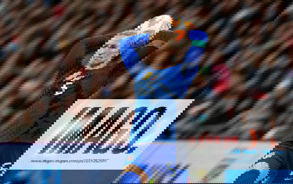 Hailie Mace (5 USA) takes a throw in during the friendly game between ...