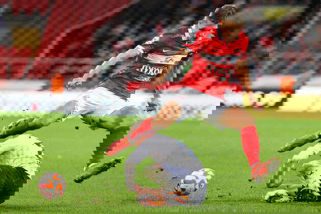 RUSSIA, MOSCOW - OCTOBER 4, 2023: Spartak Moscow s Roman Zobnin (L) and ...