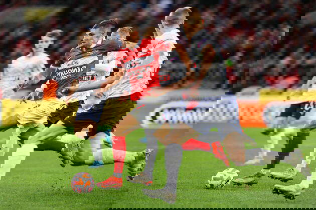 RUSSIA, MOSCOW - OCTOBER 4, 2023: Spartak Moscow s Roman Zobnin (L) and ...