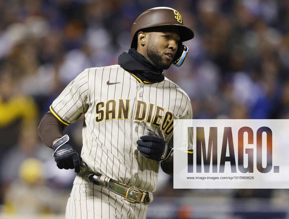 San Diego Padres Jurickson Profar heads for first after hitting a ...