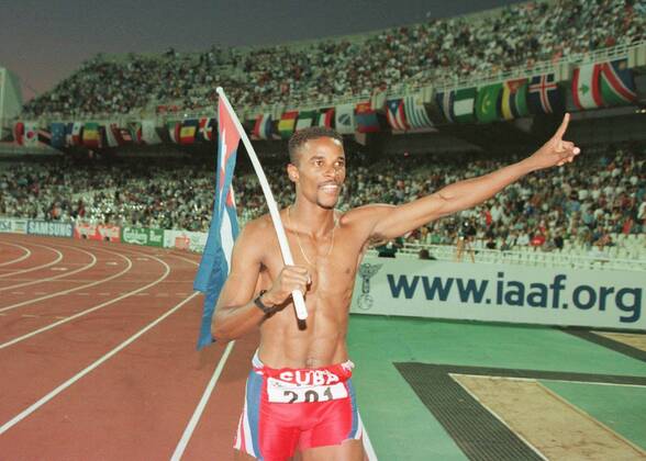 Athens 970805 ATHLETICS WC Ivan Pedroso, Cuba celebrates after winning ...