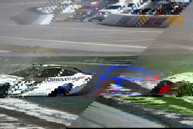 LAS VEGAS, NV - OCTOBER 16: JJ Yeley slides through the infield grass ...