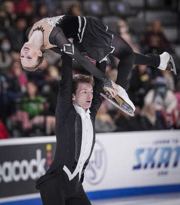 Maria Mokhova and Ivan Mokhov of the U.S. skate during the pairs short ...