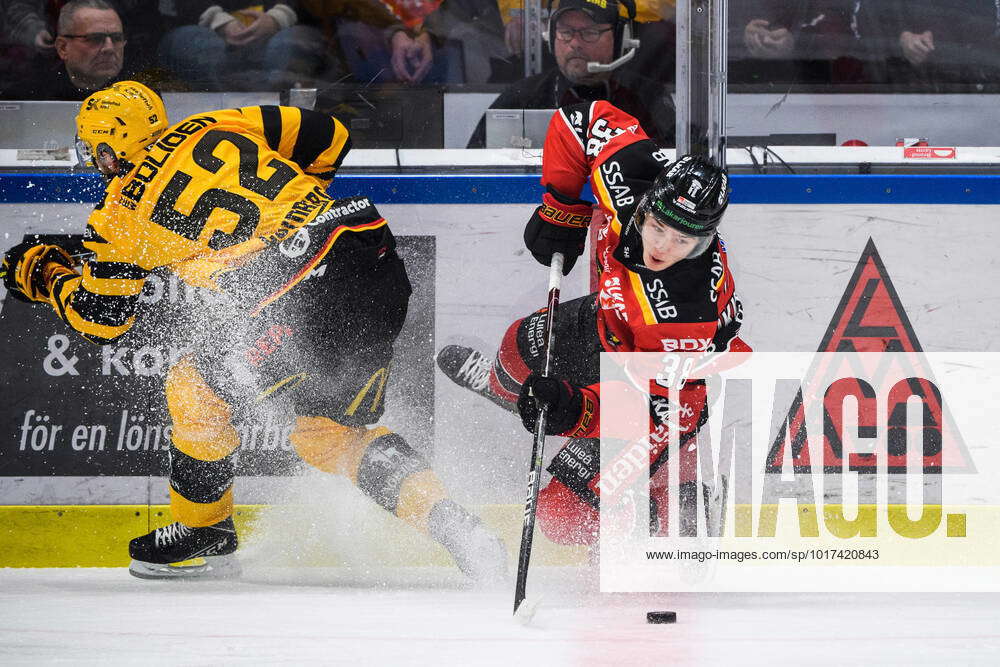221027 Arvid Lundberg of Skelleftea and Olli Nikupeteri of Lulea during ice hockey match in SHL