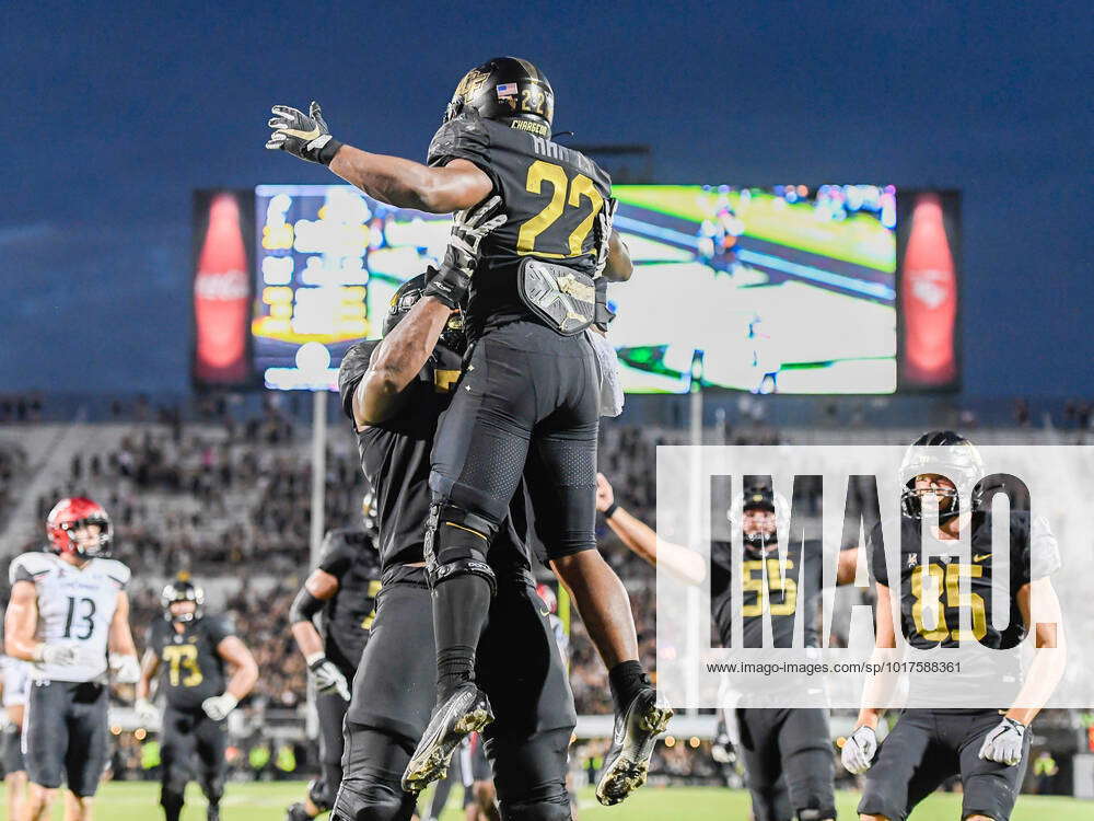 October 29, 2022 UCF Knights running back RJ Harvey (22) is hoisted by ...