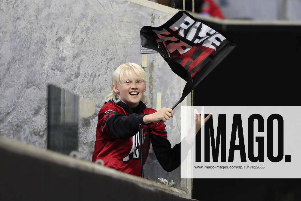 ATLANTA, GA - OCTOBER 30: A young fan enjoys the Sunday afternoon NFL ...