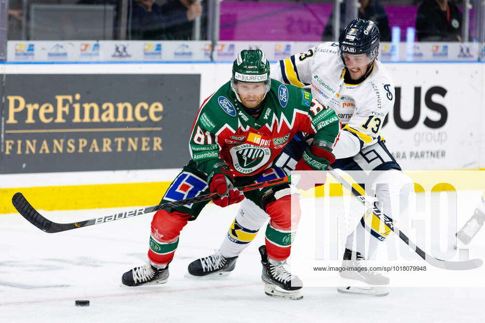 221103 Frölundas Ryan Lasch and HV71s Rasmus Bengtsson during the ice ...