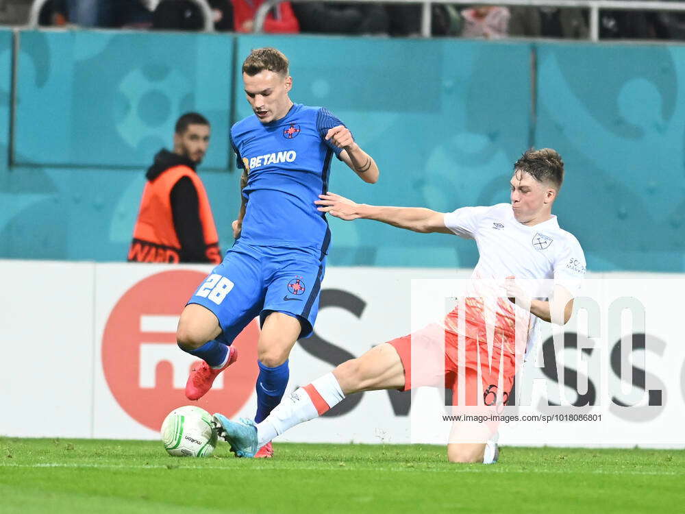 Grigoras Alexandru Pantea and Oliver Scarles in the football match ...