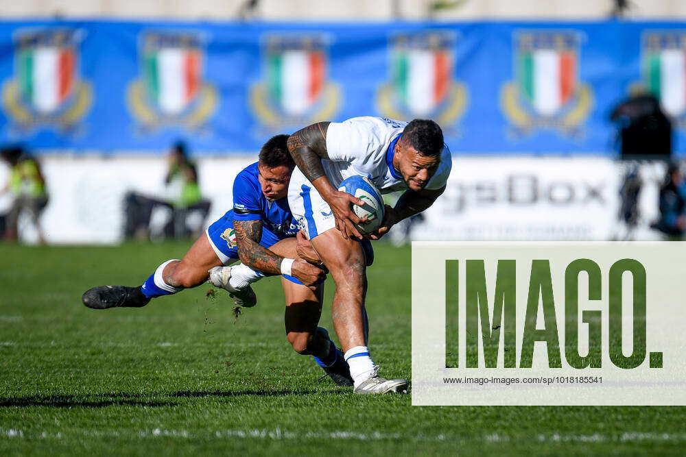 Samoa s Alapati Leiua tackled by Italy s Pierre Bruno during 2022 Test ...