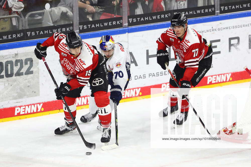 Louis Marc Aubry Koeln in duel with Maximilian Daubner Muenchen, right ...
