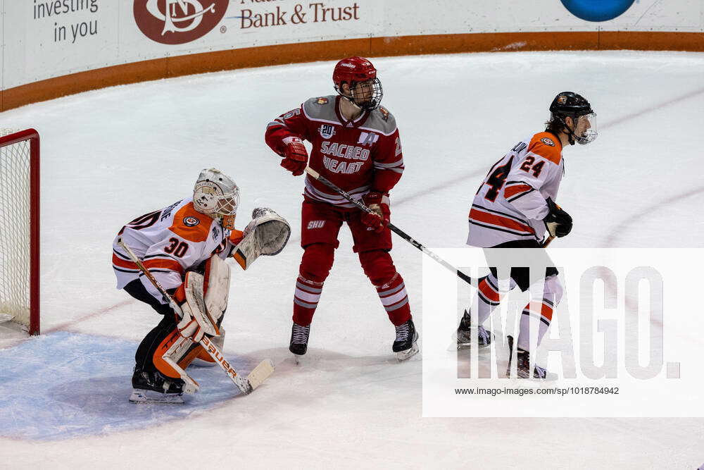 : Sacred Heart Pioneers forward Neil Shea stands in front of the net in ...