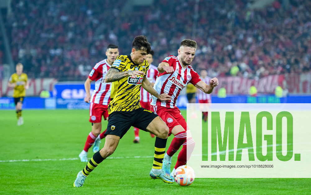 12 LAZAROS ROTA of AEK FC competing with 45 OLEG REABCIUK of Olympiacos ...