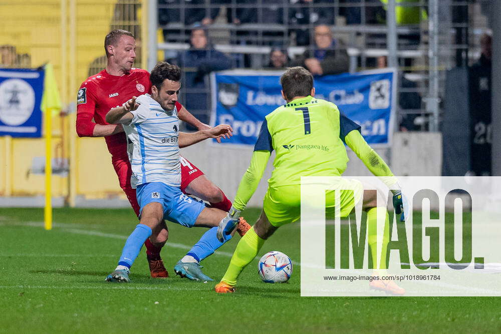 Christopher Lannert TSV 1860 Muenchen, 22 and Marco Hiller goalkeeper ...