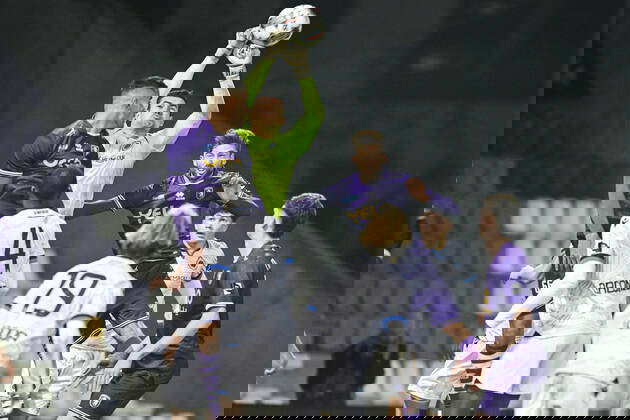 Club NXT s goalkeeper Nick Shinton and Lierse s Daan Vekemans fight for ...