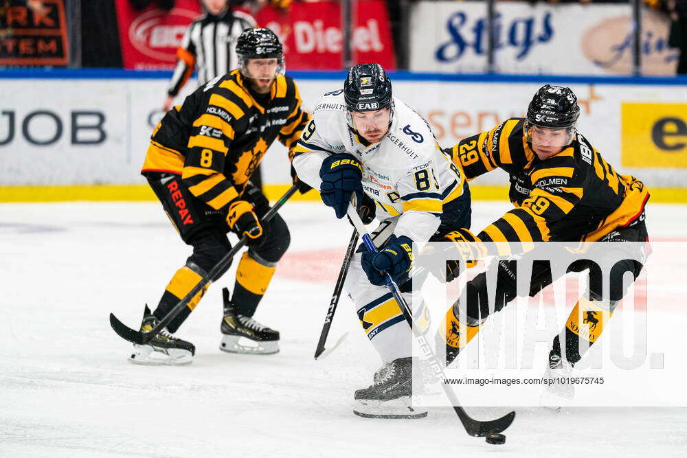 221124 HV71s Mikkel Bödker and Skellefteas Albin Sundsvik during the SHL ice hockey match between