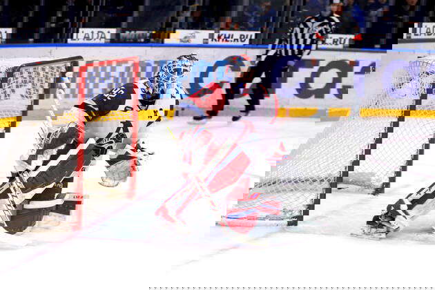 Lokomotiv Hockey Club player, Daniil Isayev (No.92) seen in action ...