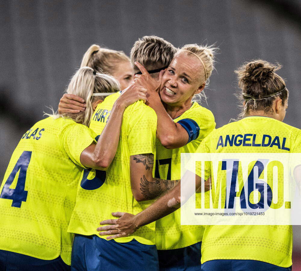 Caroline Seger hugs Lina Hurtig after 3 0 Swedish womens soccer team ...
