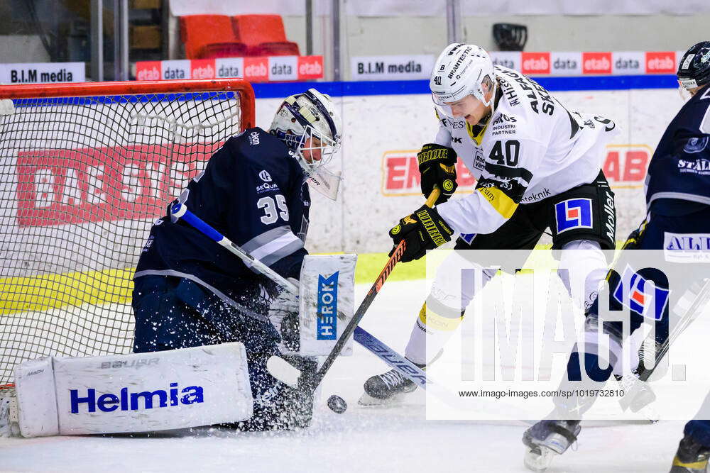 221125 Karlskogas goalie Lars Volden and Västeras Isak Skedung during ...