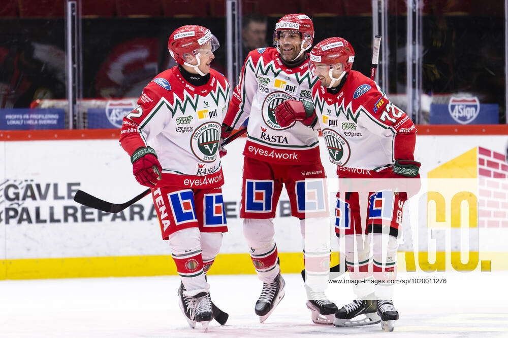 221203 Frölundas Max Friberg v makes 1 1 and is congratulated by Joel Lundqvist and Patrik