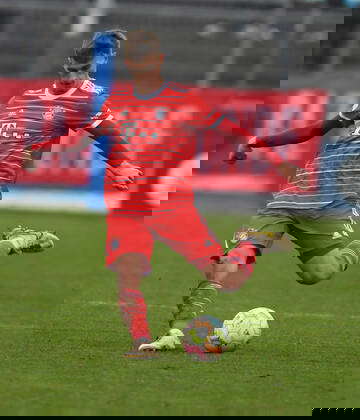 Justin Janitzek takes photos at the soccer regional league Bavaria ...